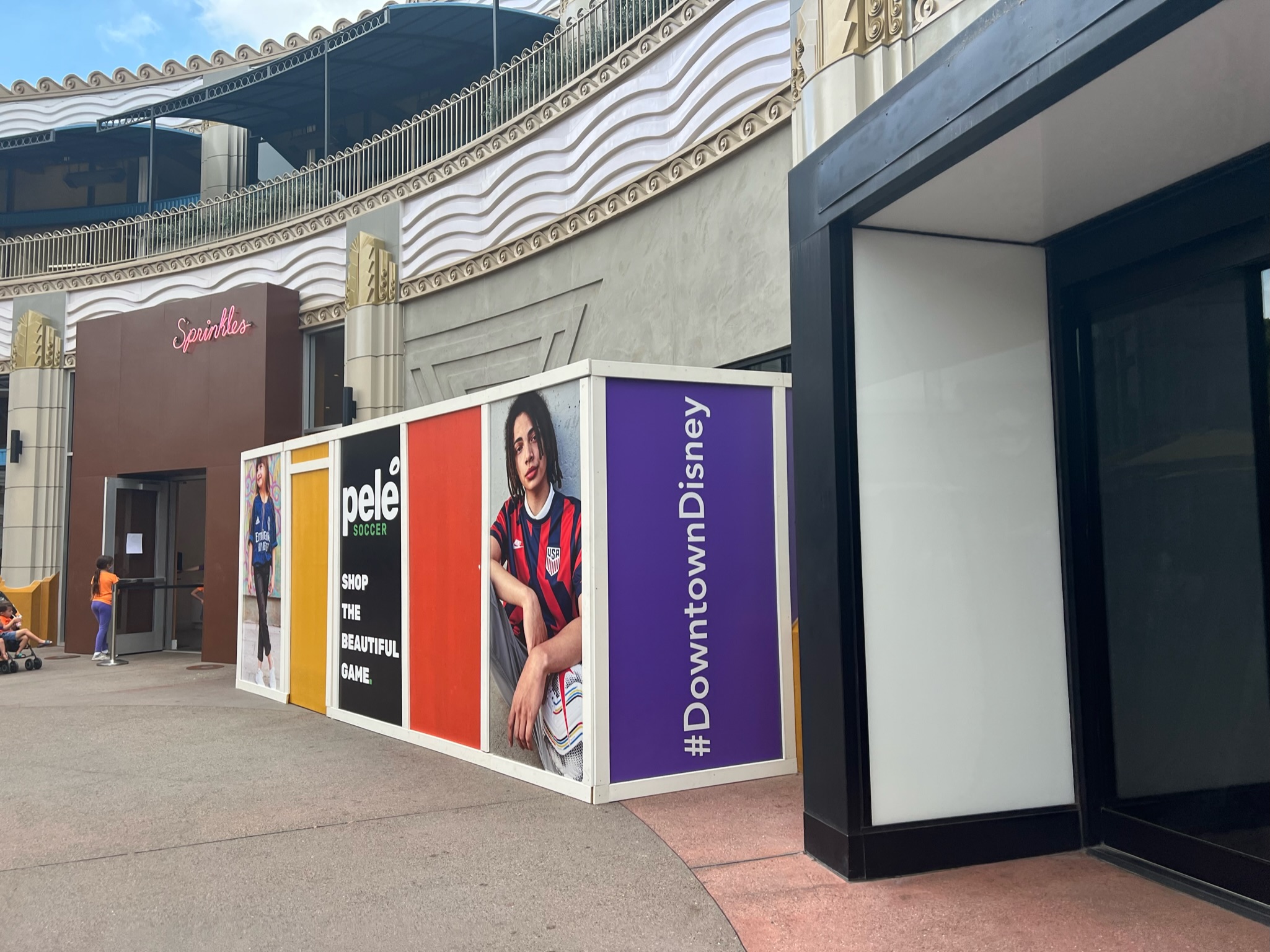 Pelé Walls Go Up Around Former Home of The Void at Downtown Disney District
