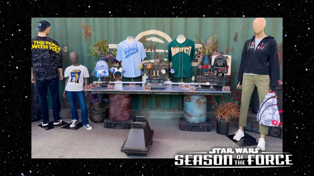 A Mouse Droid, Apparel, and Lightsabers Among Star Wars Merchandise at ...